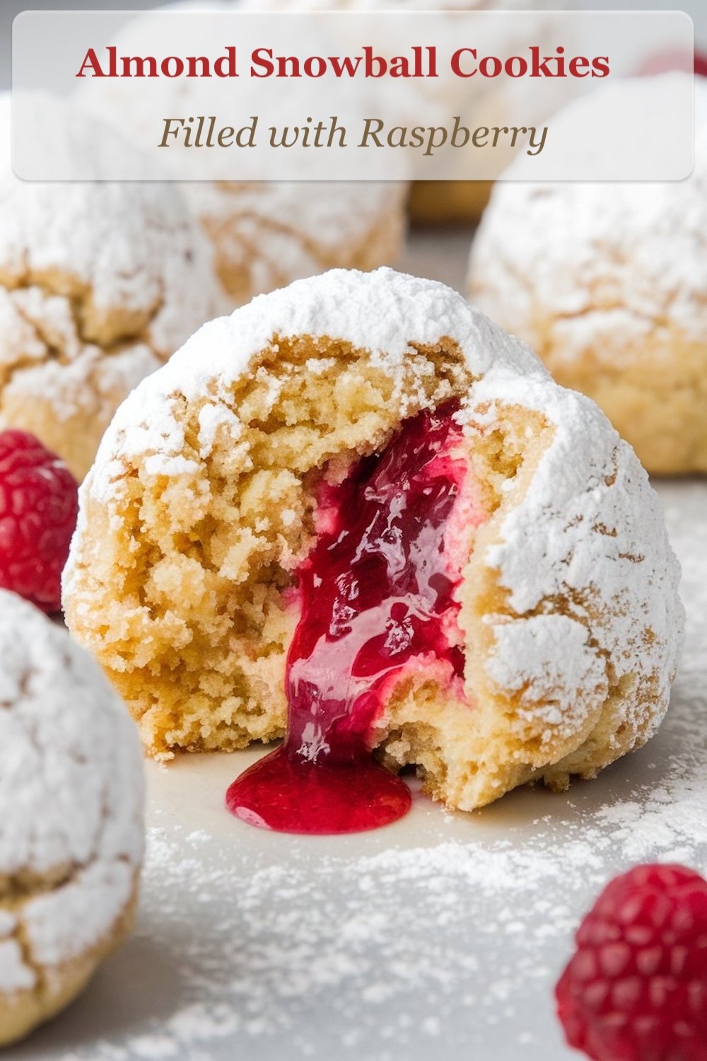 Raspberry Filled Almond Snowball Cookies - Emma's Cake Studio